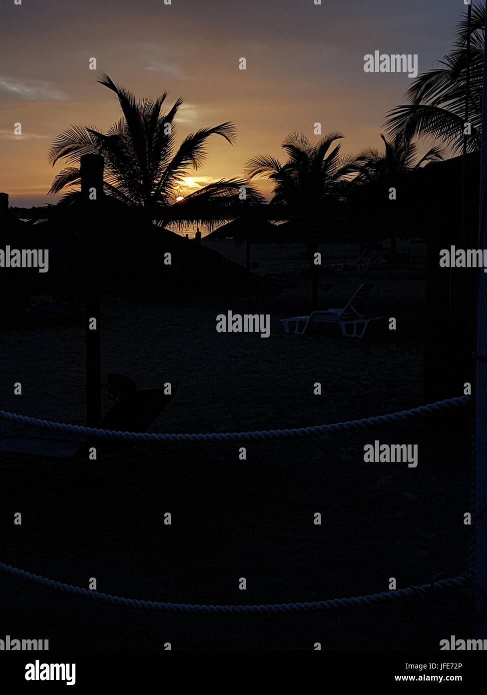 Sunset over Senegalese beach resort's beach, Saly, Senegal Stock Photo ...