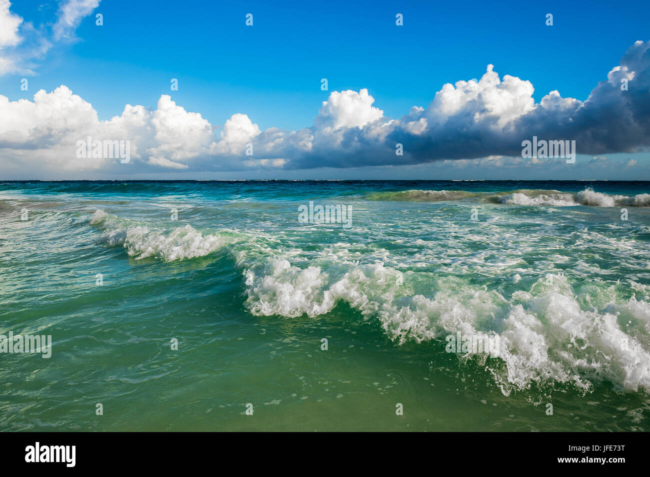 Waves crashing on the beach Stock Photo - Alamy