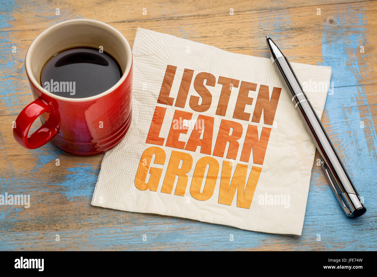 Listen, learn, grow - inspirational word abstract on a napkin with a ...