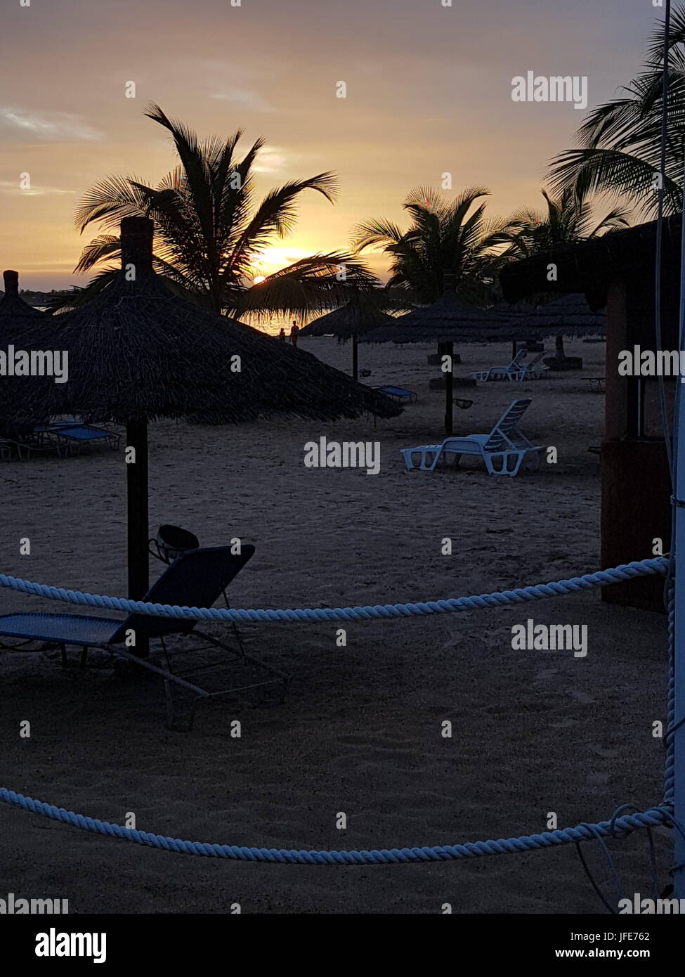 Sunset over Senegalese beach resort's beach, Saly, Senegal Stock Photo ...