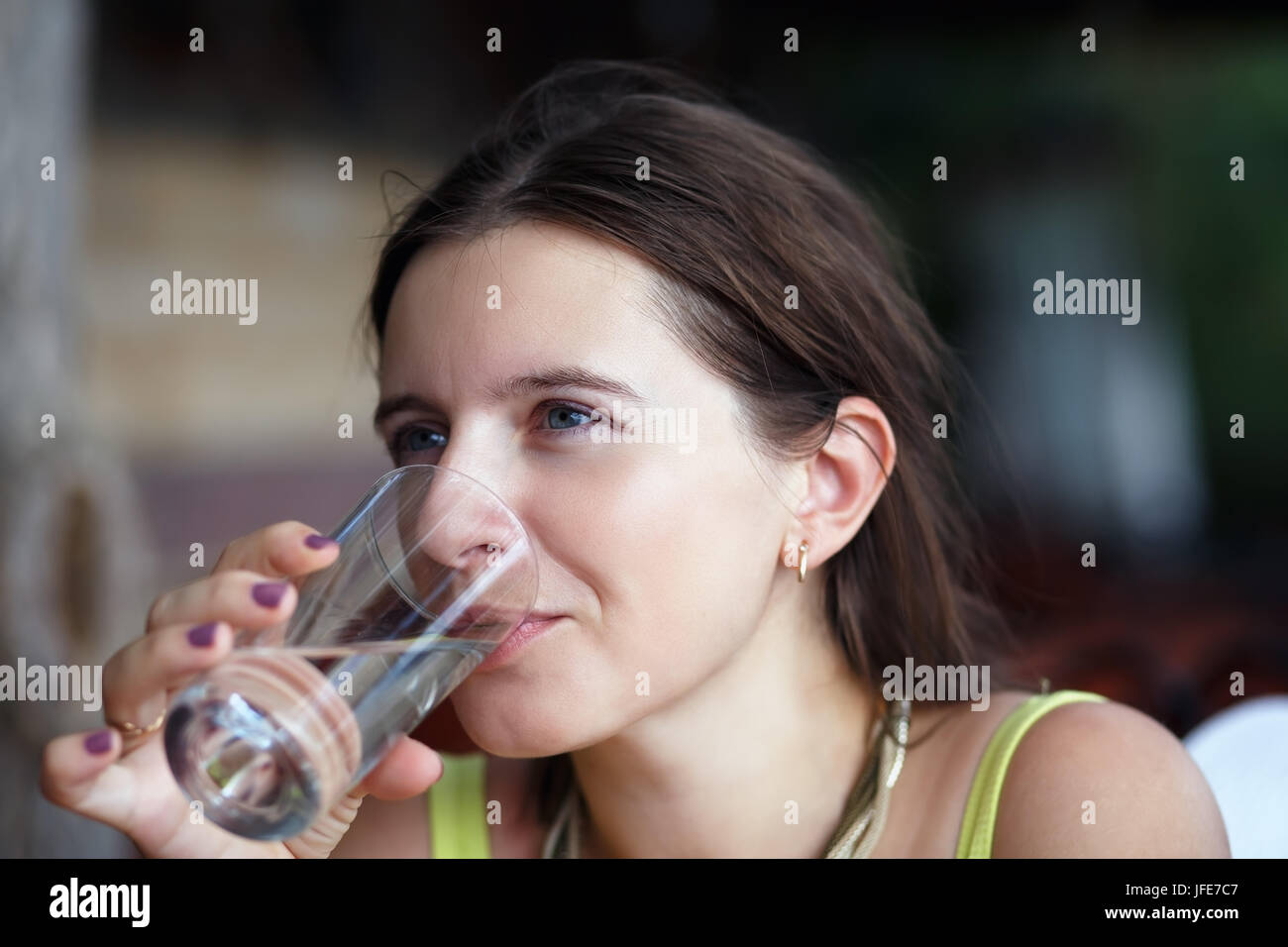 Woman drinking water Stock Photo - Alamy