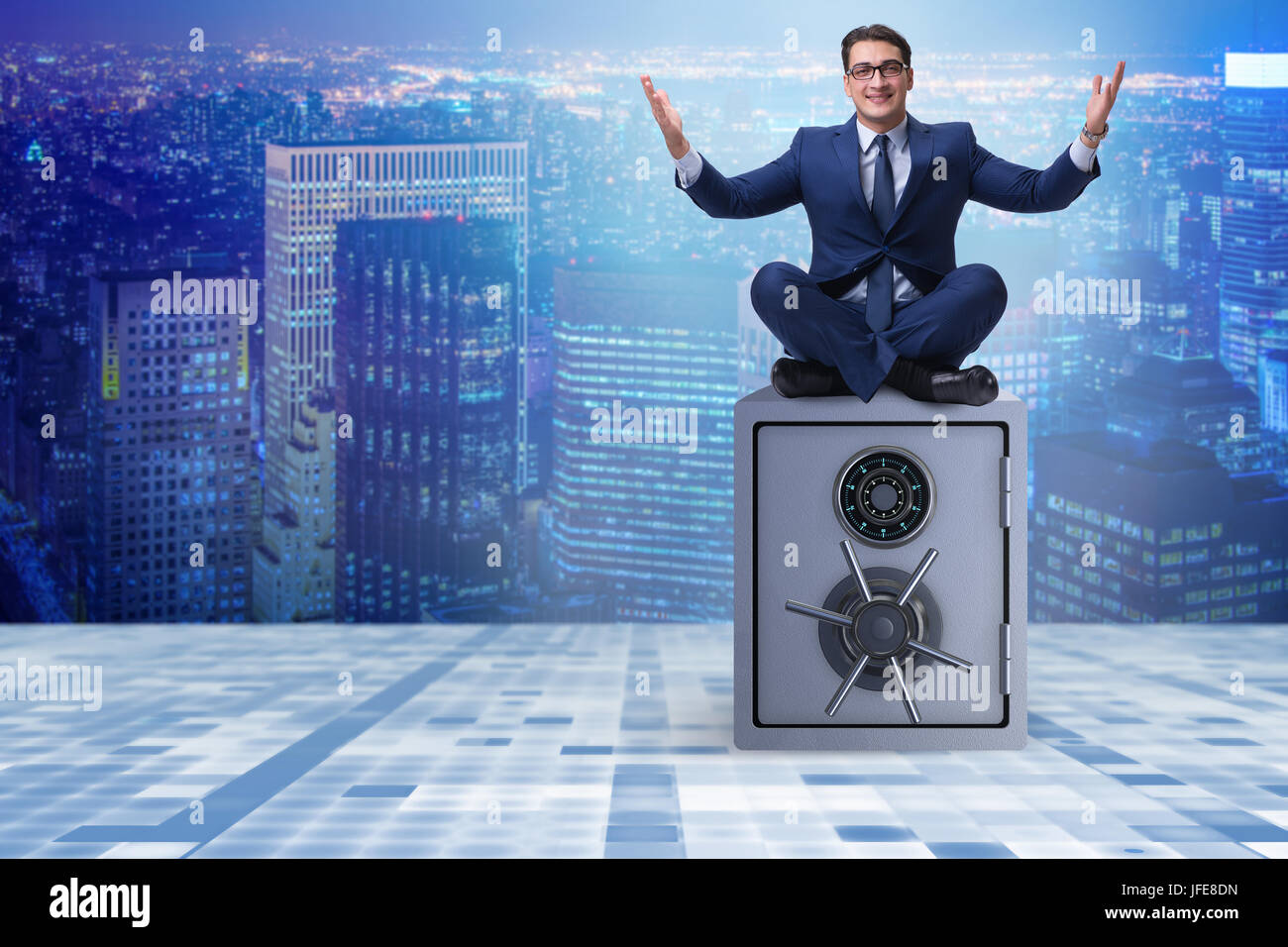 Businessman resting putting leg on safe Stock Photo - Alamy