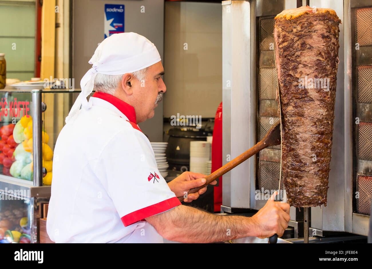 ISTANBUL, TURKEY - 1 APRIL , 2017:Man cooks Turkish meat kebab at a ...
