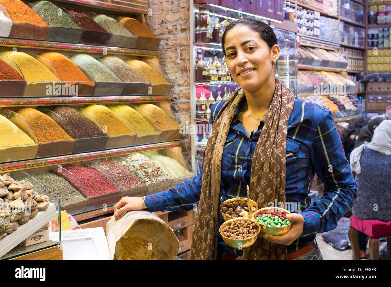 ISTANBUL, TURKEY - 7 APRIL , 2017: Sellers of spices and sweets in the ...