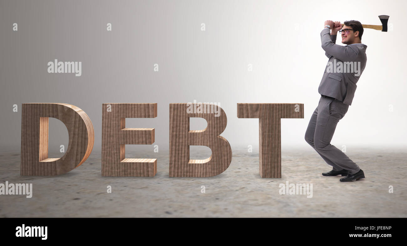 Angry man with axe axing the word debt Stock Photo - Alamy
