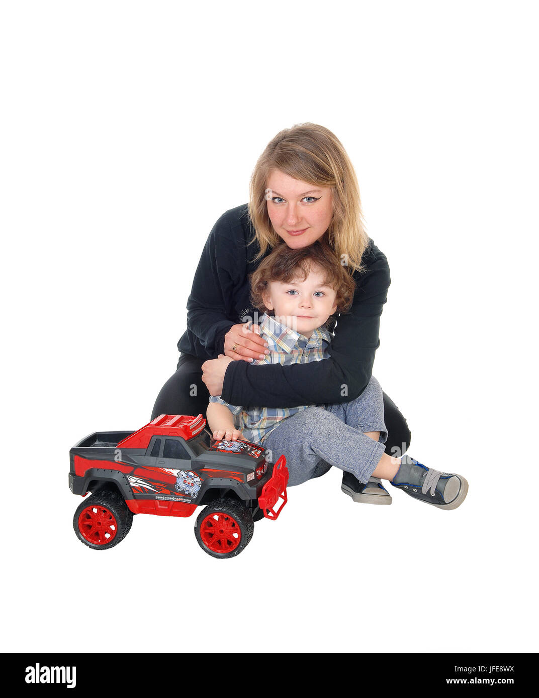 Boy hugging mother hi-res stock photography and images - Alamy