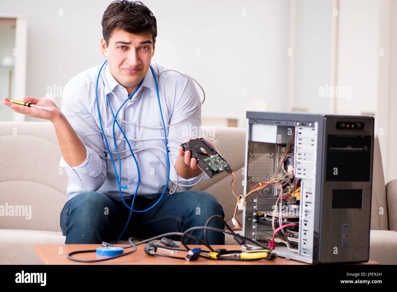 The frustrated man with broken pc computer Stock Photo - Alamy