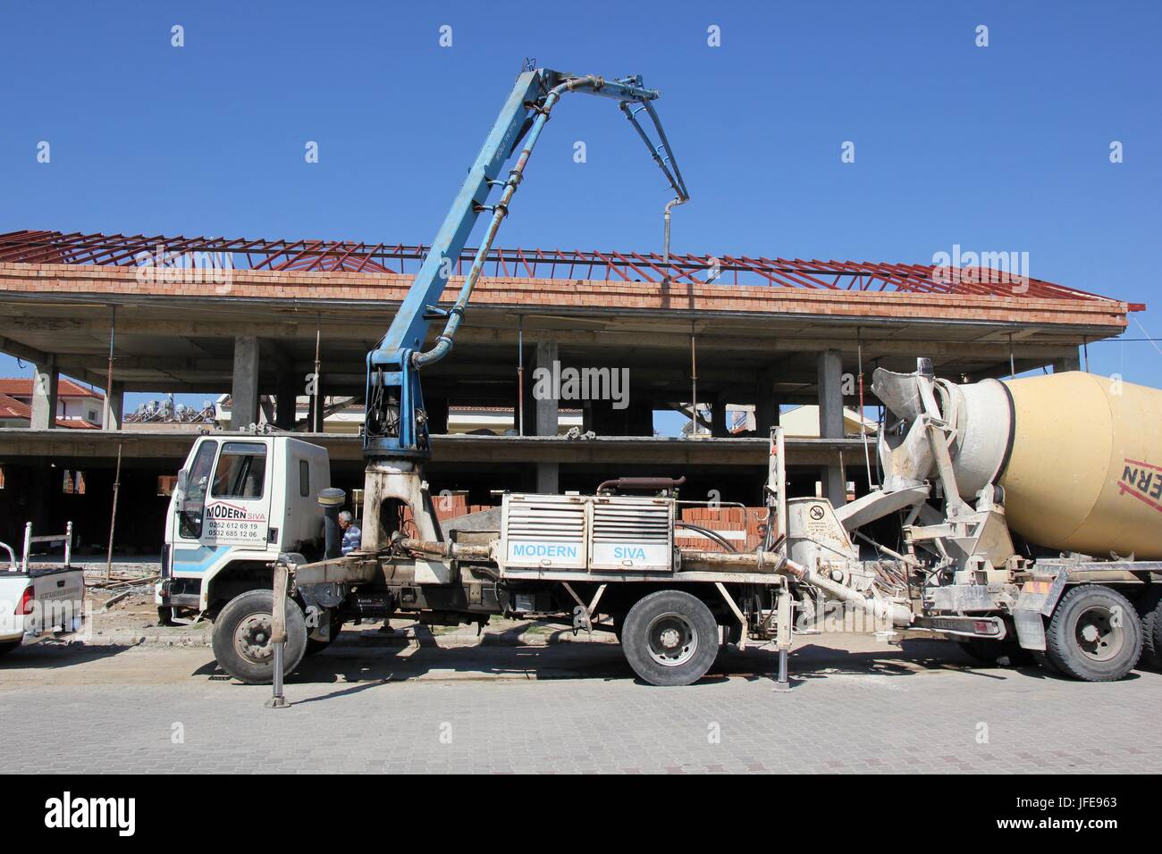 Pouring concrete crane hi-res stock photography and images - Alamy