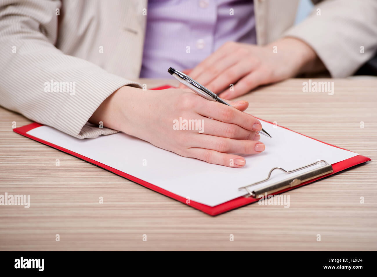 Hands taking notes in the pad Stock Photo - Alamy