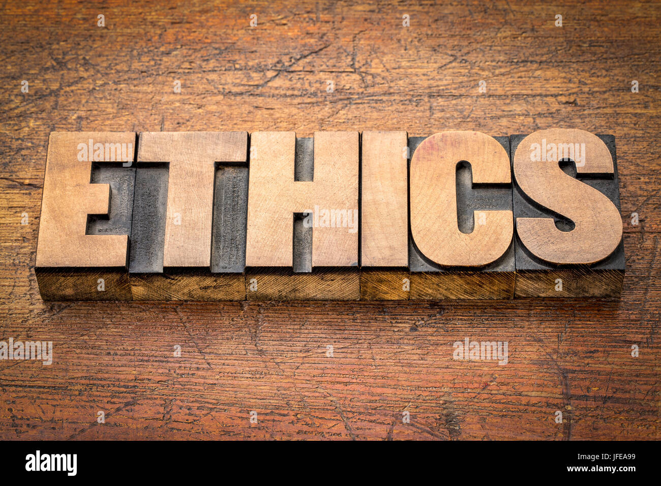 ethic word abstract in letterpress printing blocks against rustic ...