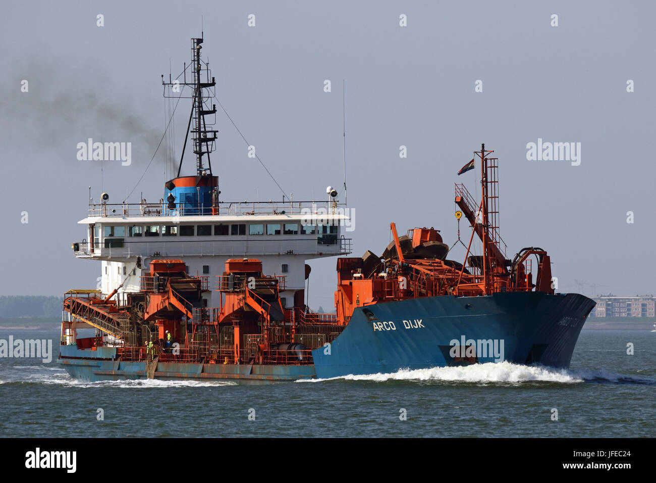 The dredger Arco Dijk enters the port of Antwerp Stock Photo - Alamy