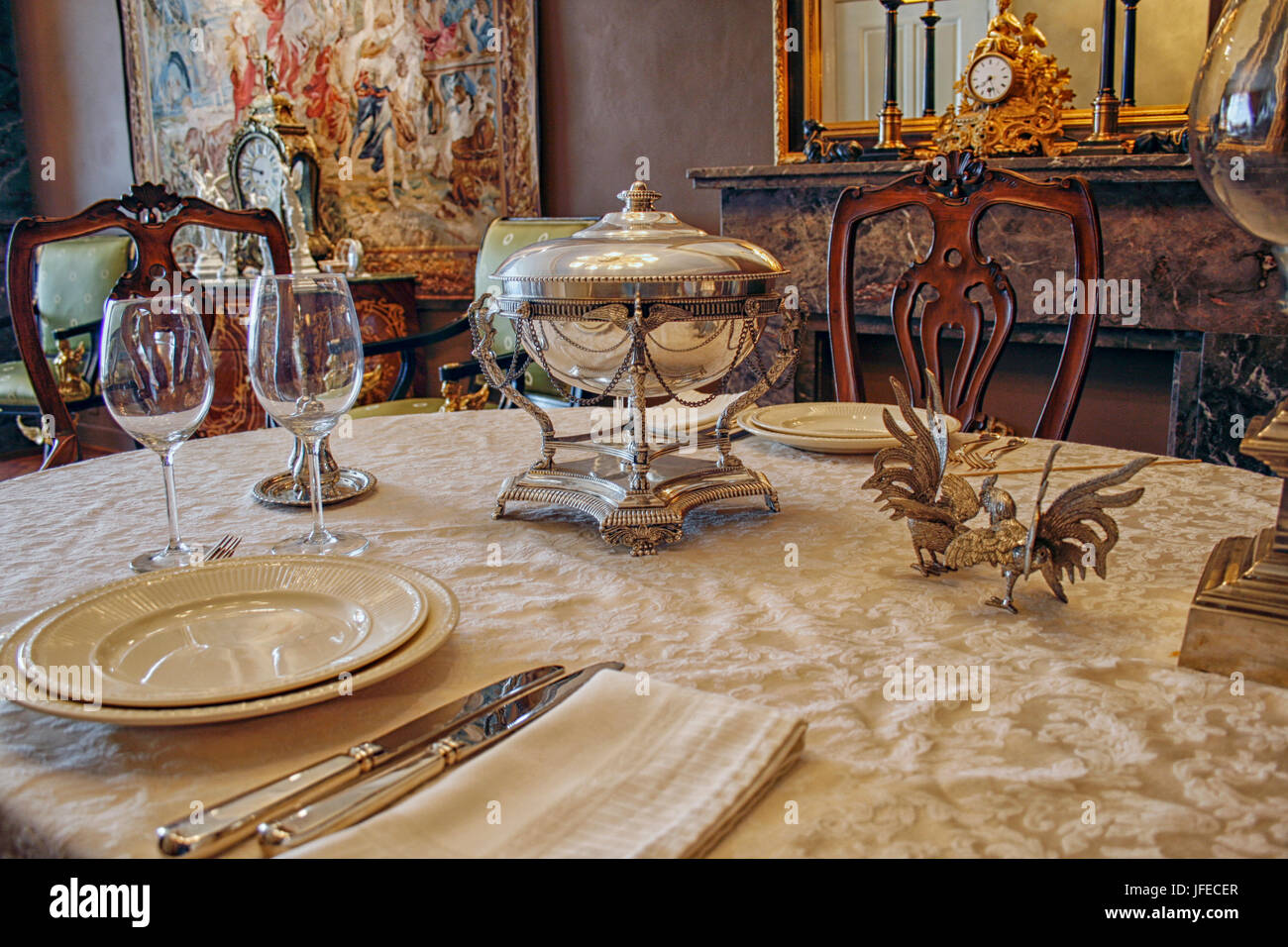 beautifully set table with antique silverware Stock Photo - Alamy
