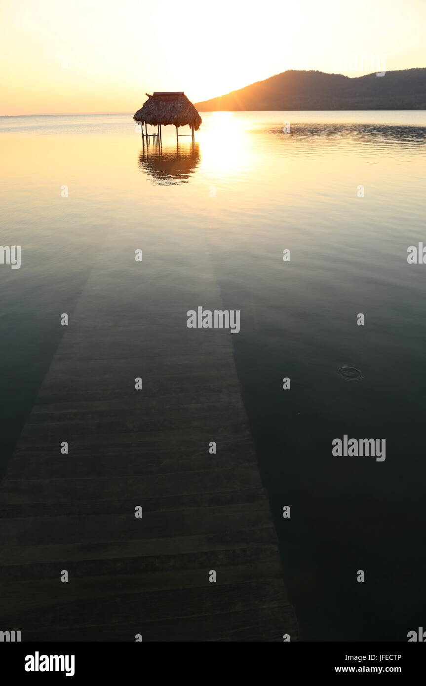 Overwater Hut and Sunset - Lake Peten Itza in Guatemala Stock Photo - Alamy