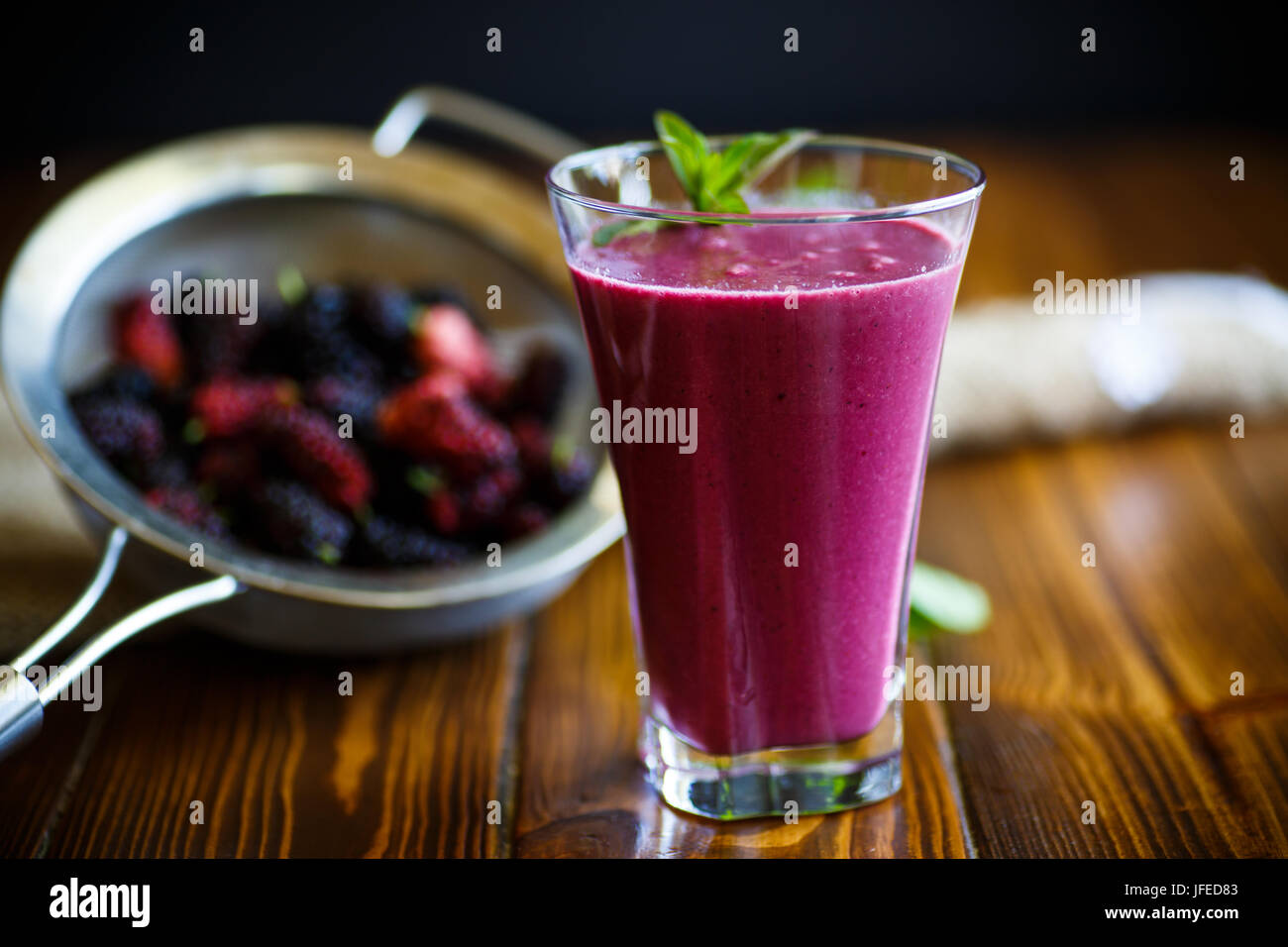 Sweet berry smoothie from black mulberry Stock Photo - Alamy