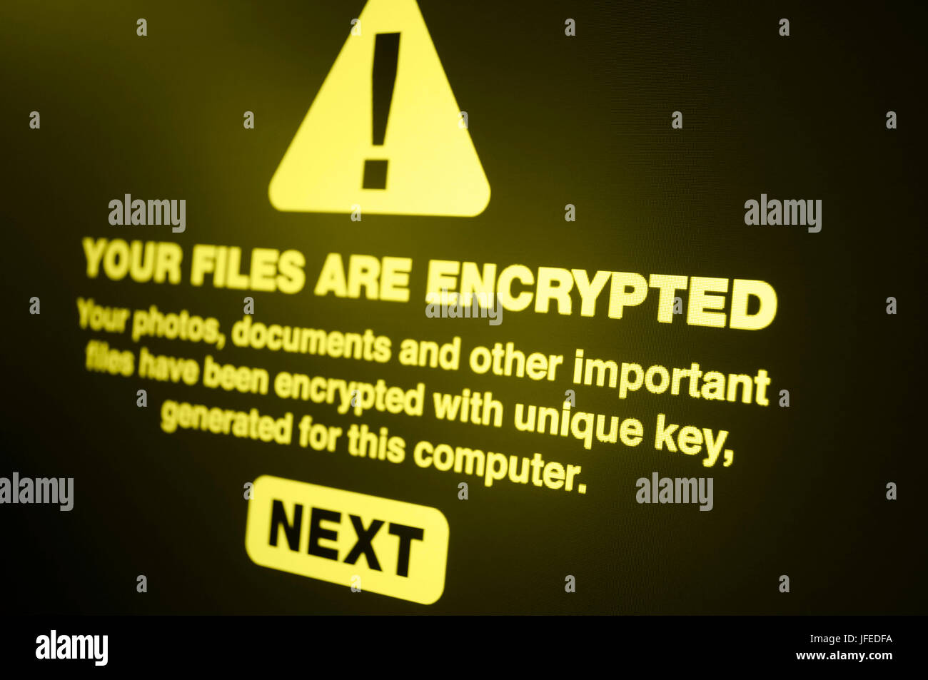 Ransomware - Sign on the screen Stock Photo - Alamy