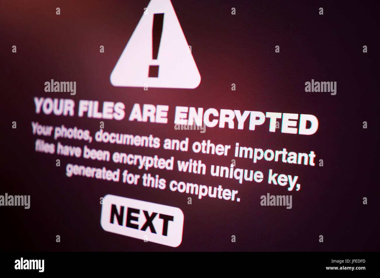 Ransomware - Sign on the screen Stock Photo - Alamy