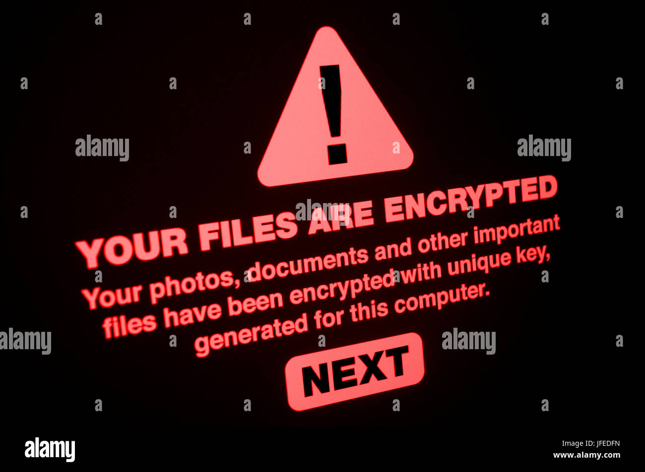 Ransomware - Sign on the screen Stock Photo - Alamy