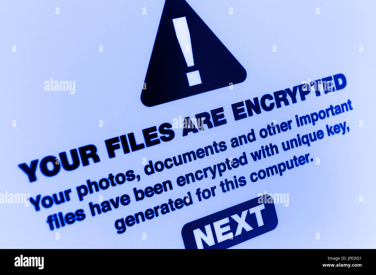 Ransomware - Sign on the screen Stock Photo - Alamy