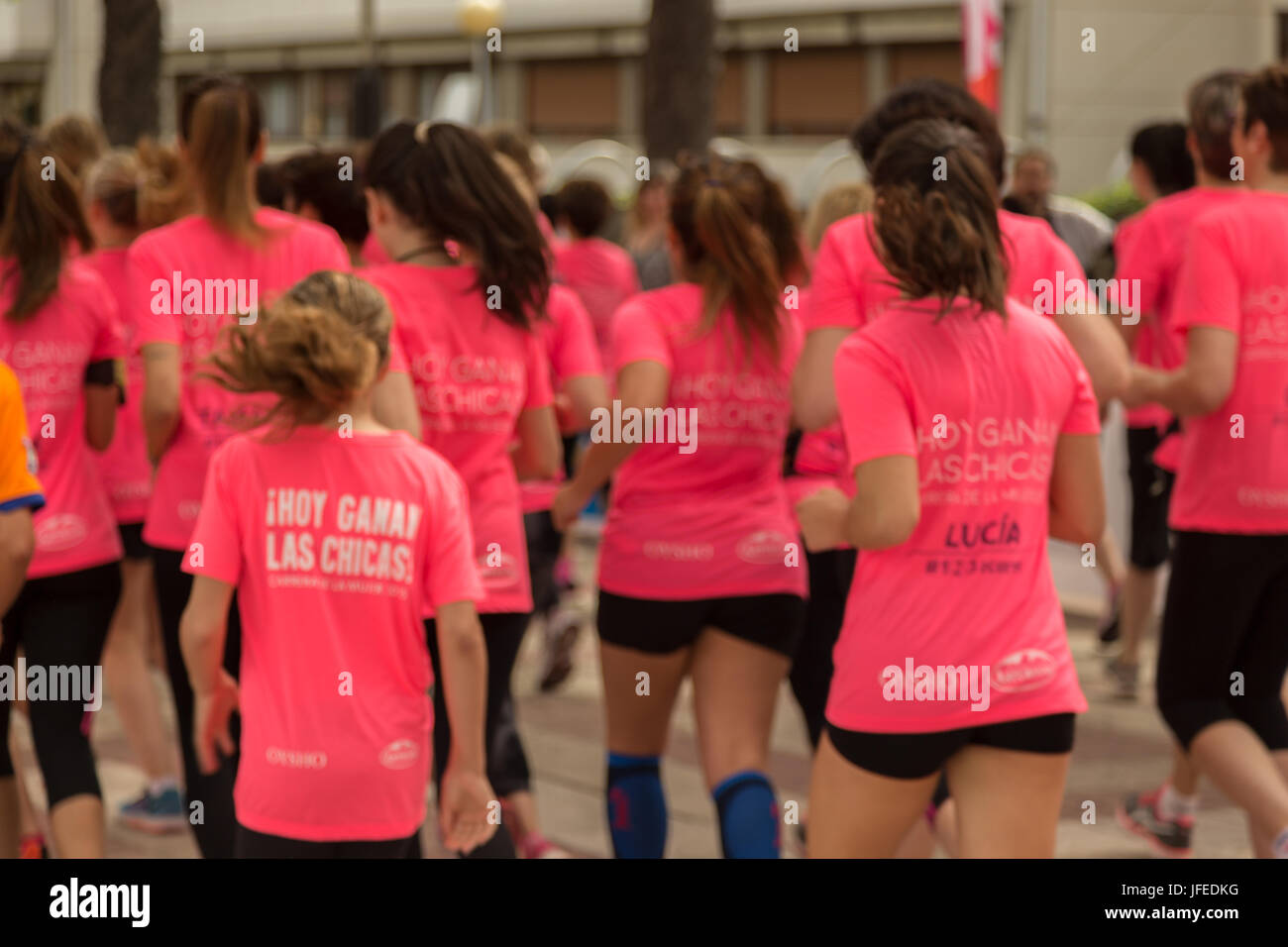 Women running in a race against cancer Stock Photo - Alamy
