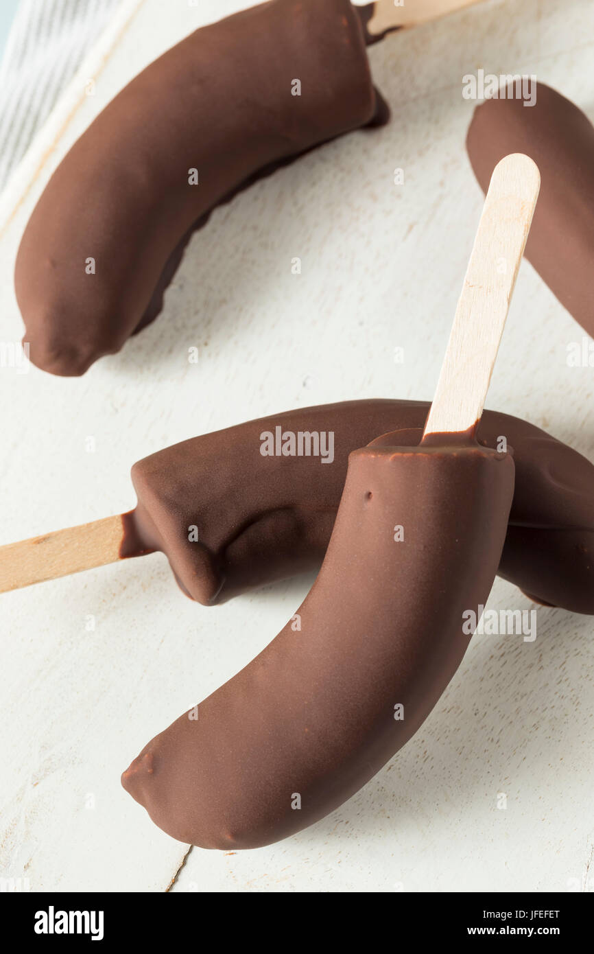 Homemade Frozen Chocolate Covered Bananas on a Stick Stock Photo - Alamy