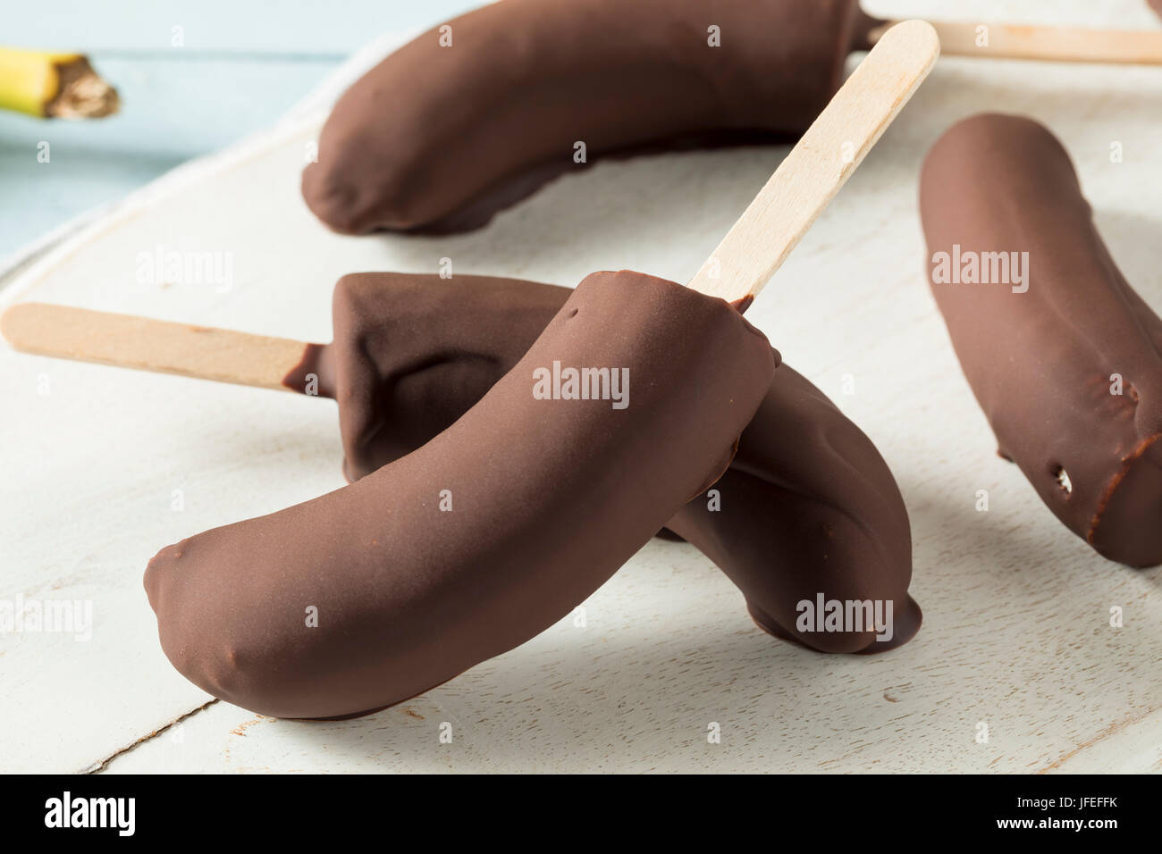 Homemade Frozen Chocolate Covered Bananas on a Stick Stock Photo - Alamy