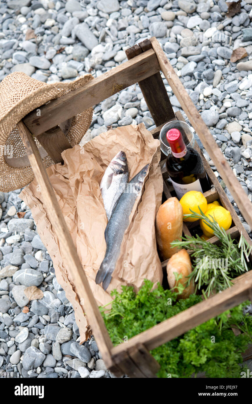 Fish, branzino, grill box Stock Photo - Alamy