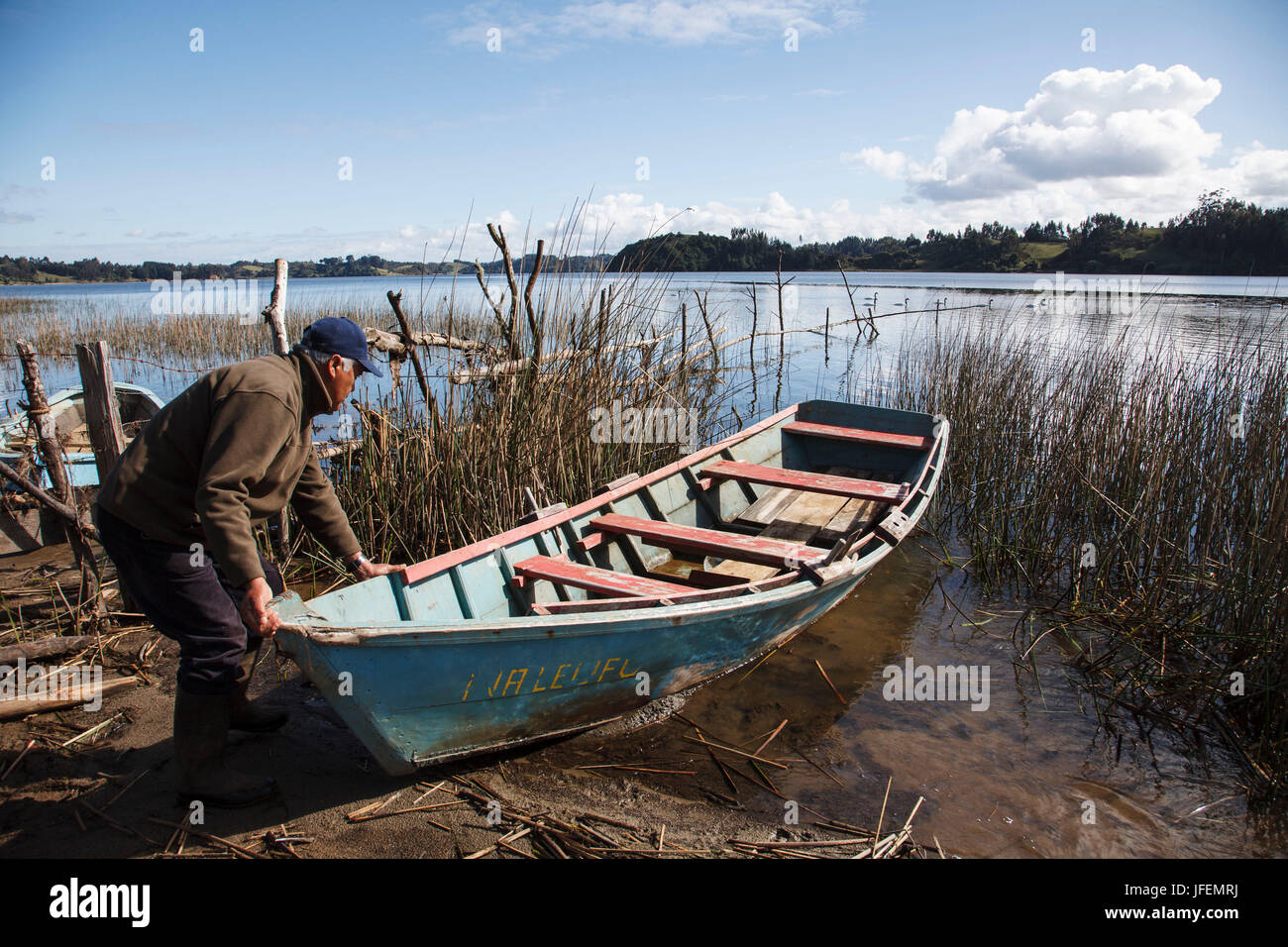 Chile, Araucania, Lago Budi, Llaguepulli, Mapuche, man, Boat Stock ...