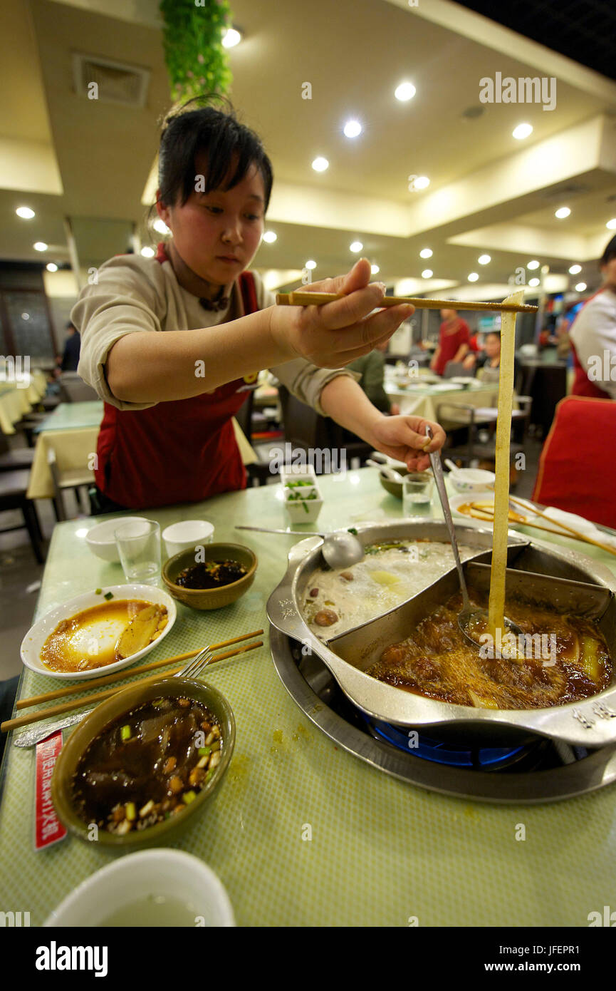 China, Hebei Province, Chengde, restaurant of Chinese fondue Stock ...