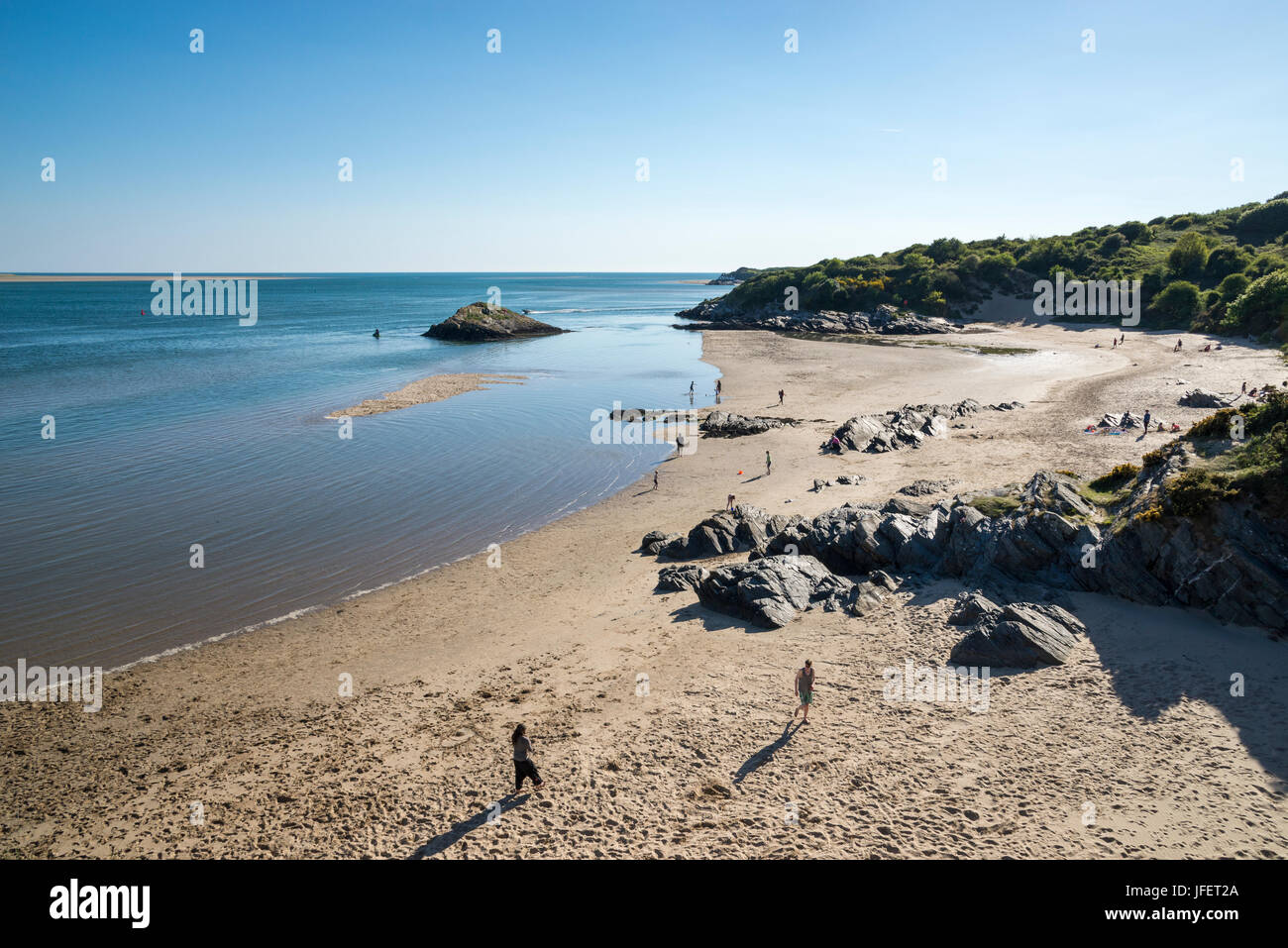 People enjoying the beach at Borth y Gest near Porthmadog, Wales on a ...