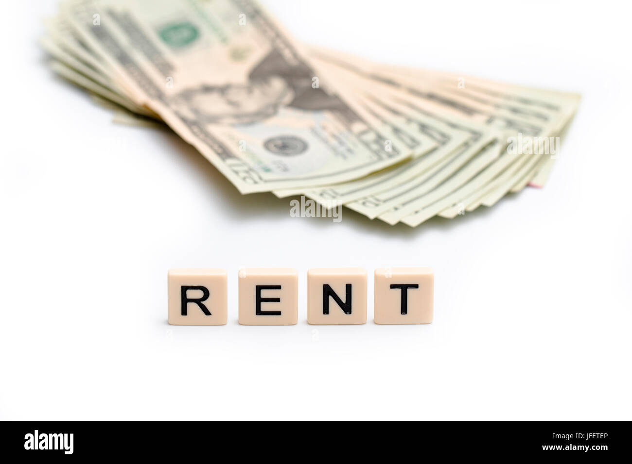 Rent Spelled Out in Tiles Stock Photo - Alamy