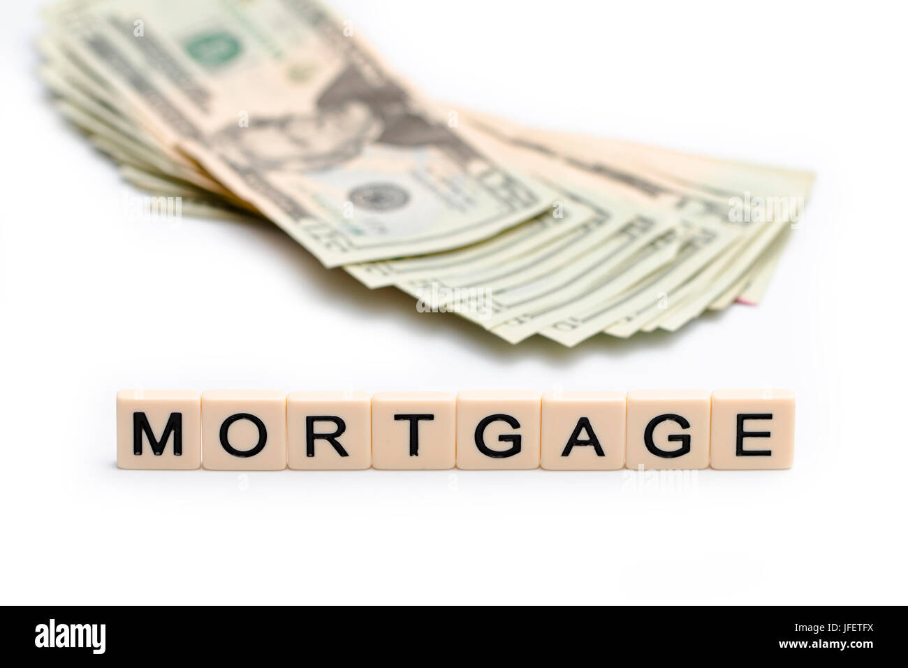 Mortgage Spelled Out in Tiles Stock Photo - Alamy