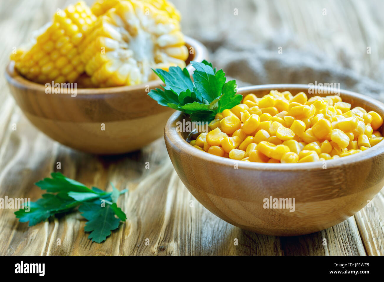 Canned corn in a wooden bowl Stock Photo - Alamy