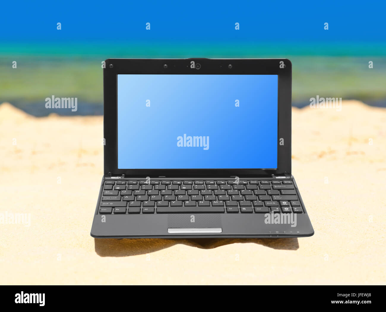 Notebook on beach Stock Photo - Alamy