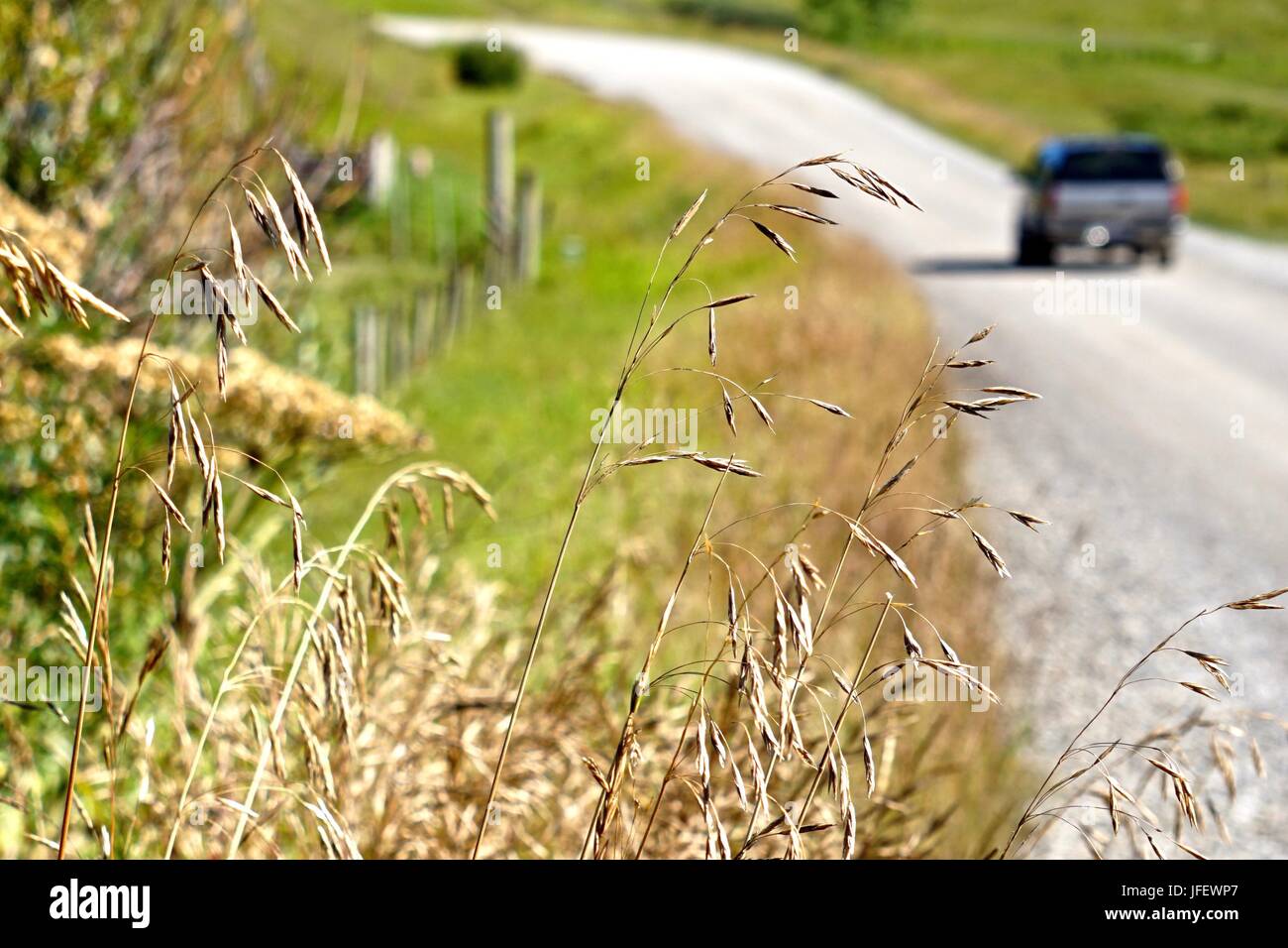Lone truck on country road Stock Photo - Alamy