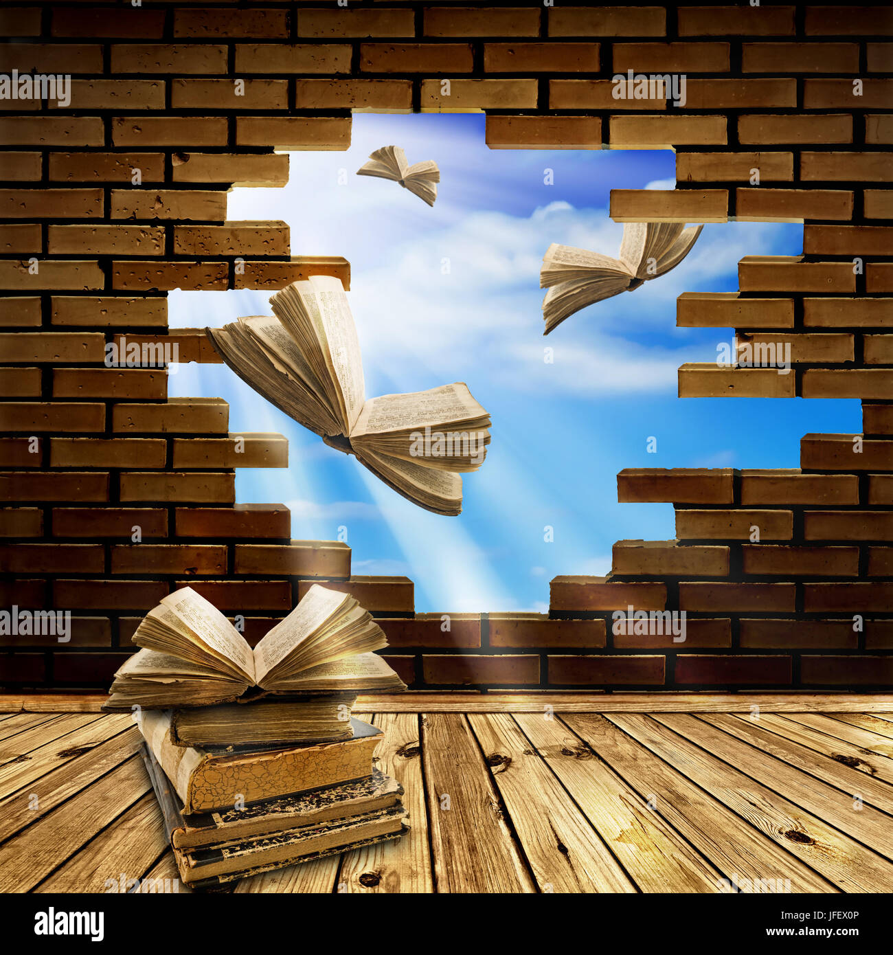 Books Flying through Brick Wall Hole Stock Photo - Alamy
