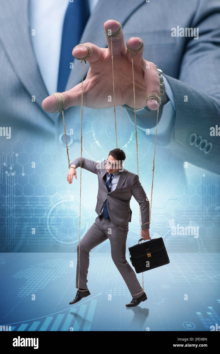 Businessman puppet being manipulated by boss Stock Photo - Alamy