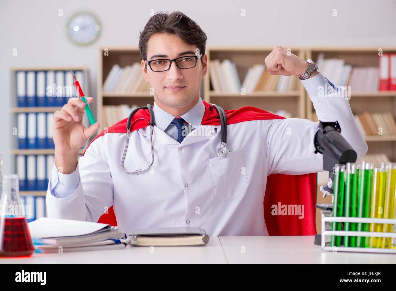 Superhero doctor working in the lab hospital Stock Photo - Alamy