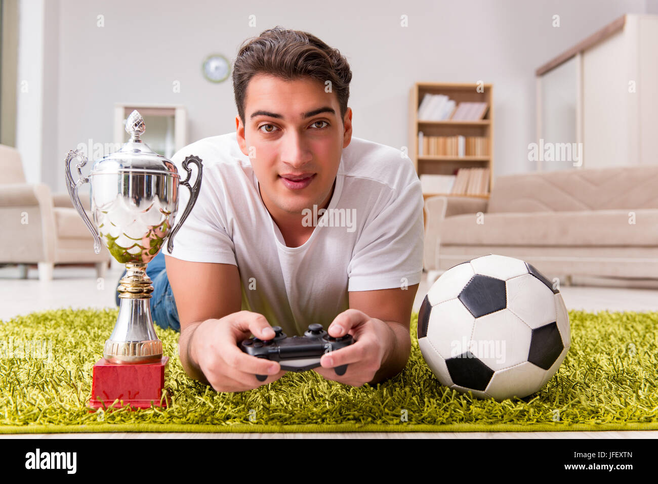 Man addicted to computer games Stock Photo - Alamy