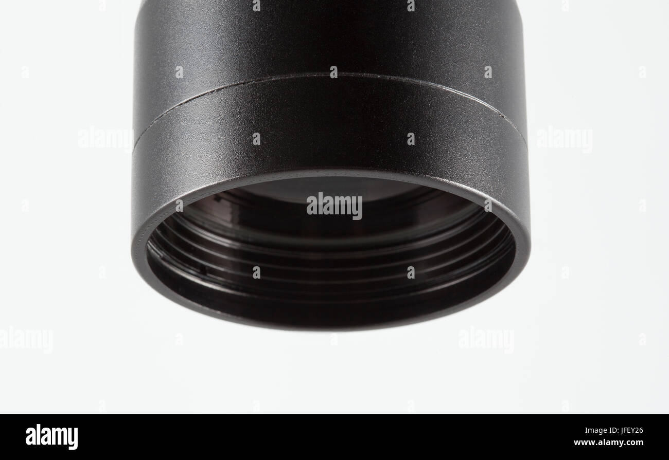 Lens from a scope looking down on a white background Stock Photo - Alamy