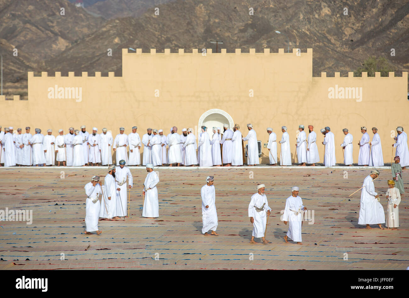 Nizwa, Oman - June 26th 2017: omani people in traditional clothing at a ...