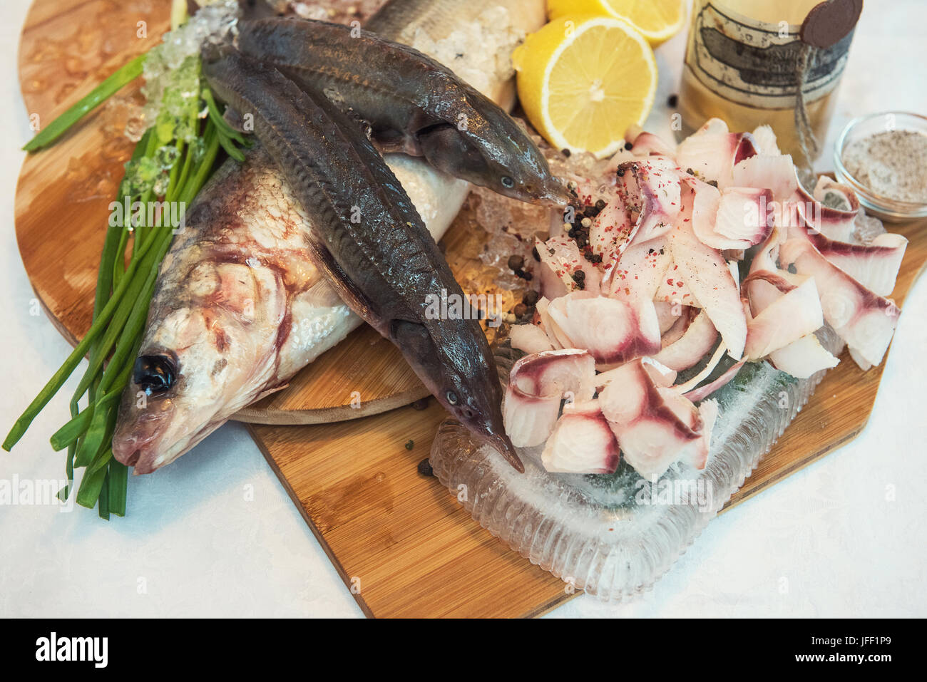 Sliced frozen raw fish from whitefish Stock Photo - Alamy