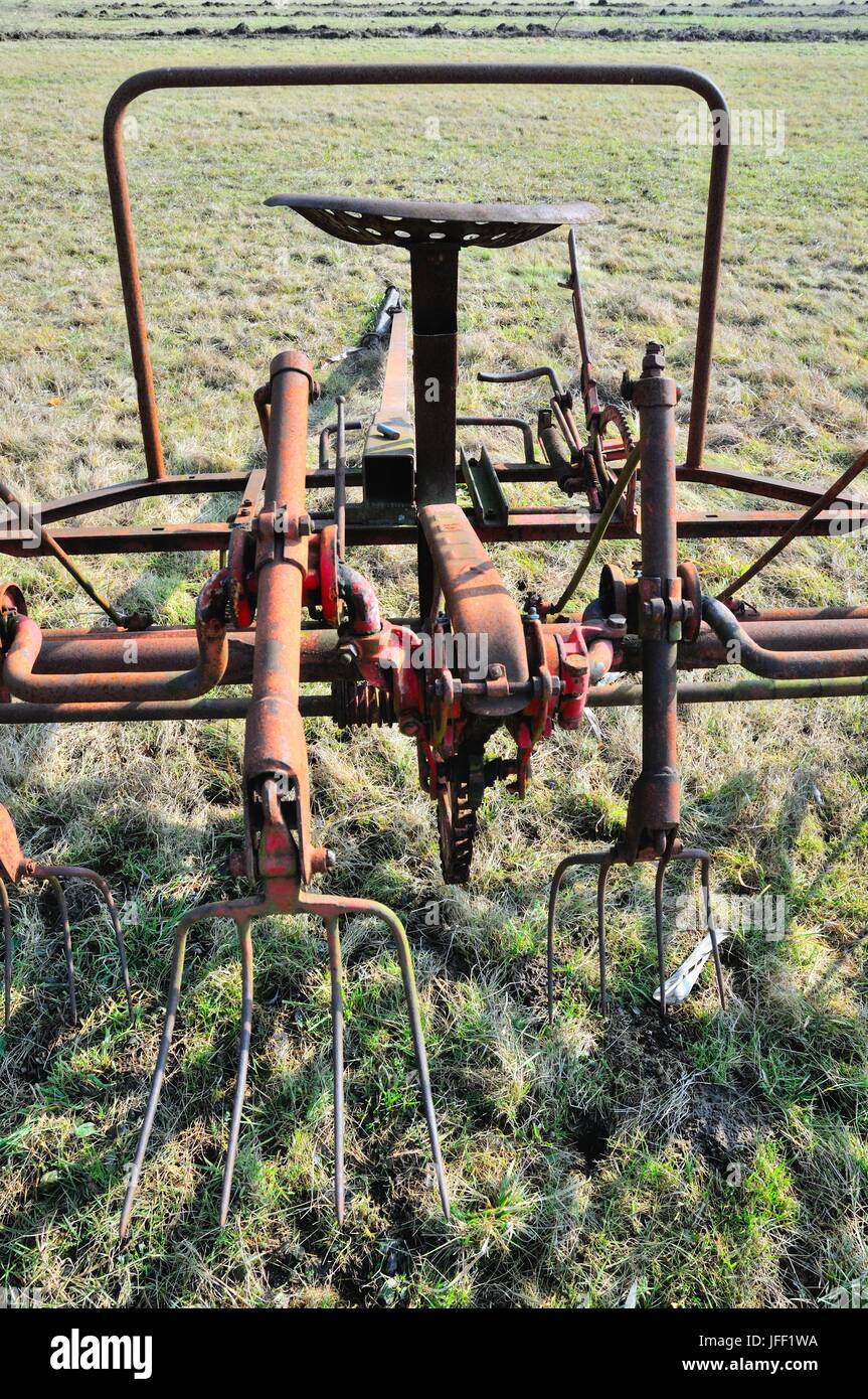 Tedder turning grass hi-res stock photography and images - Alamy