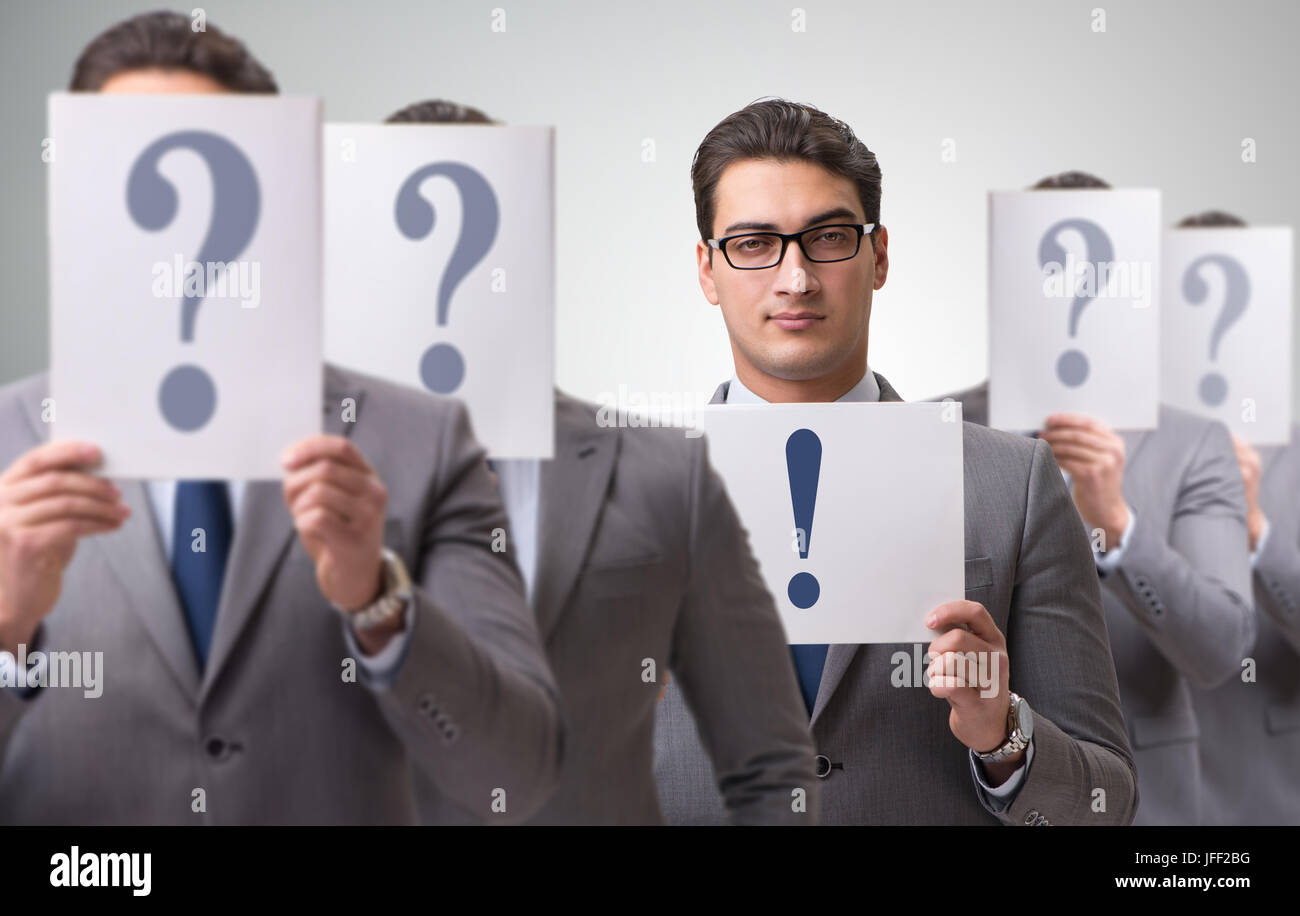Businessman having answer to many questions Stock Photo - Alamy