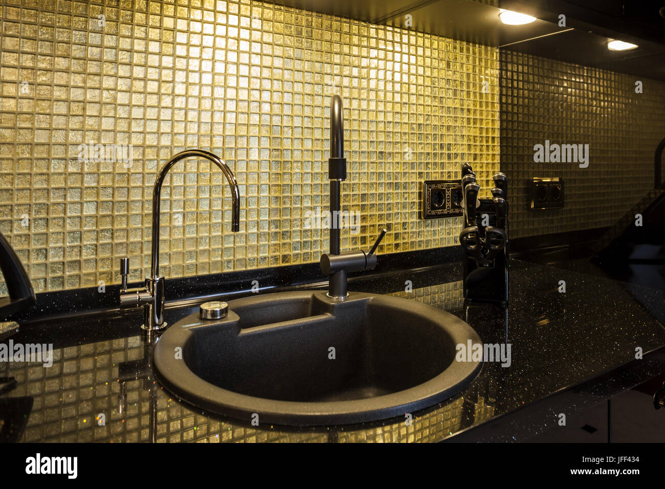 Kitchen desktop with a sink and faucet Stock Photo - Alamy