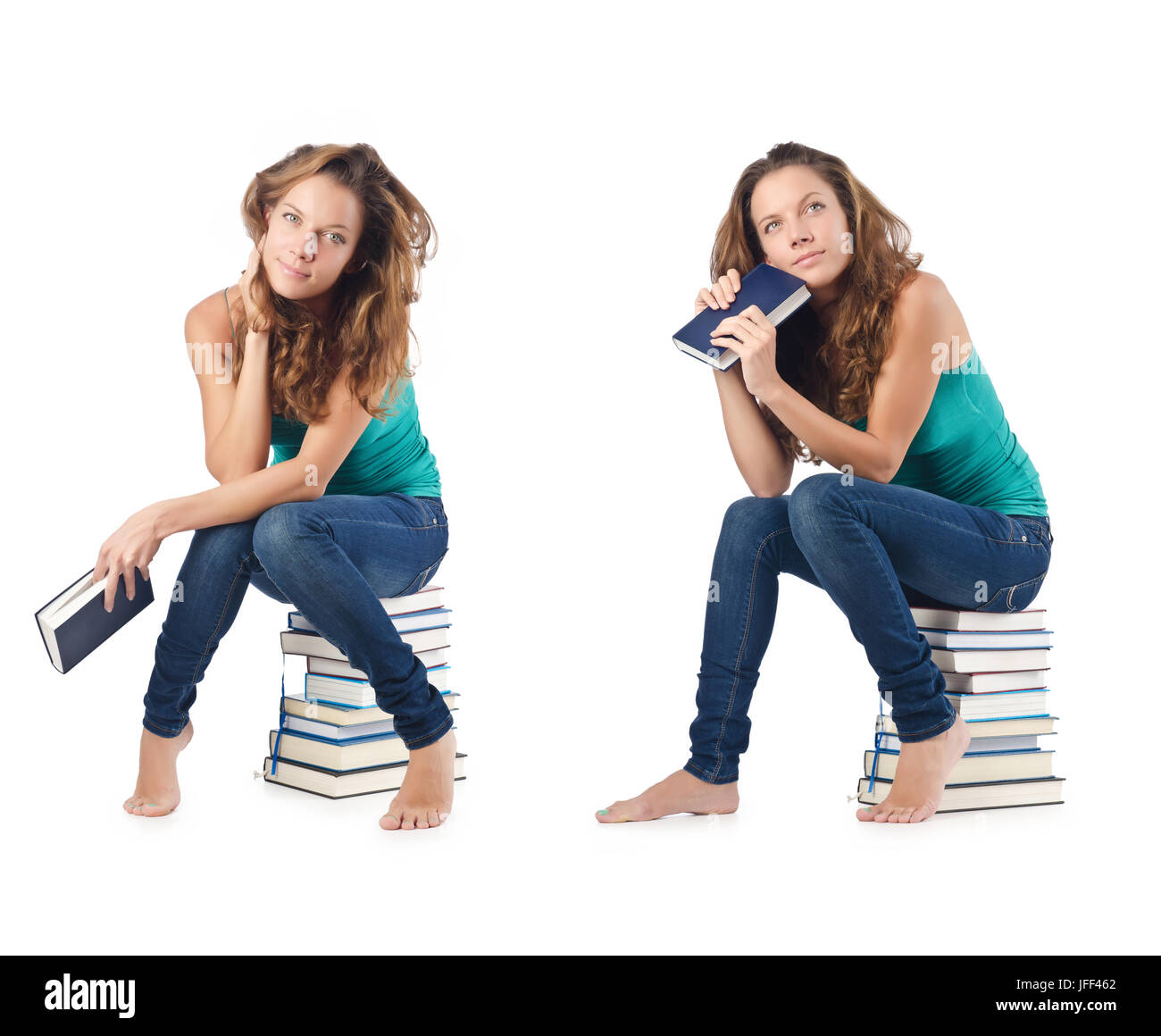 Student sitting on stack of books Stock Photo - Alamy