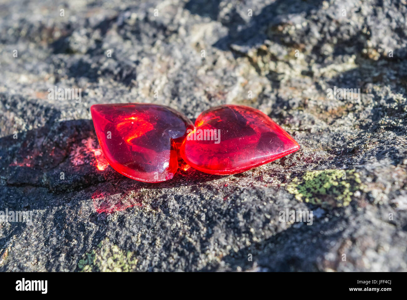 two hearts on a rock Stock Photo - Alamy