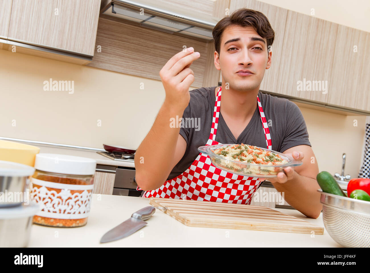 Man male cook preparing food in kitchen Stock Photo - Alamy