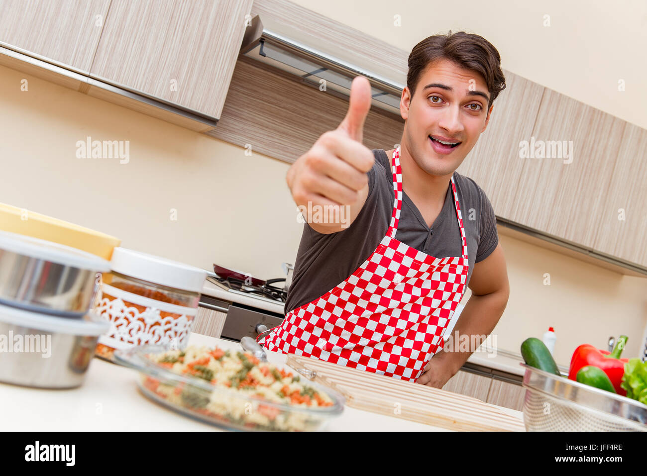 Man male cook preparing food in kitchen Stock Photo - Alamy