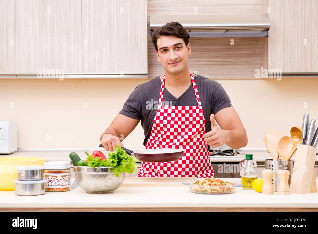 Man male cook preparing food in kitchen Stock Photo - Alamy