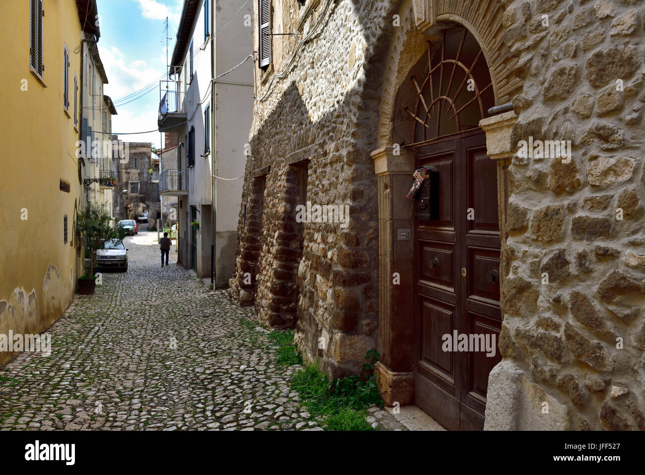 Narrow lane between buildings in village of Cori, province of Latina ...